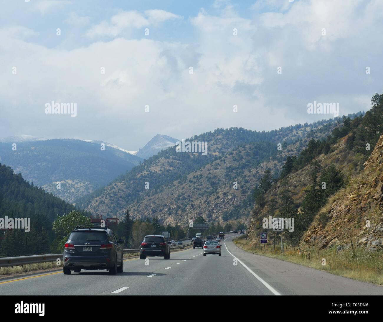 COLORADO, USA—OCTOBER 2017: Scenic view of winding road and cars ...