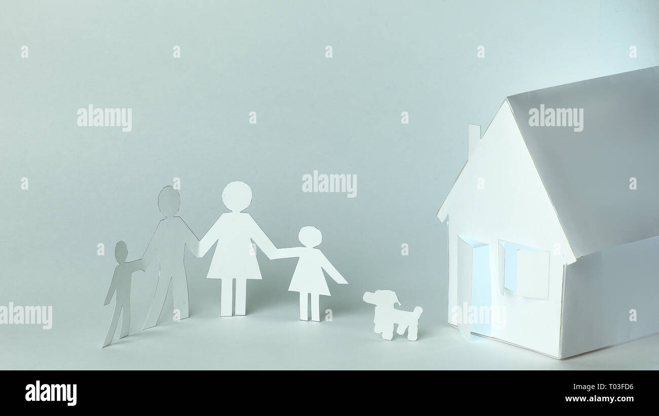 men made of paper and paper house Stock Photo - Alamy