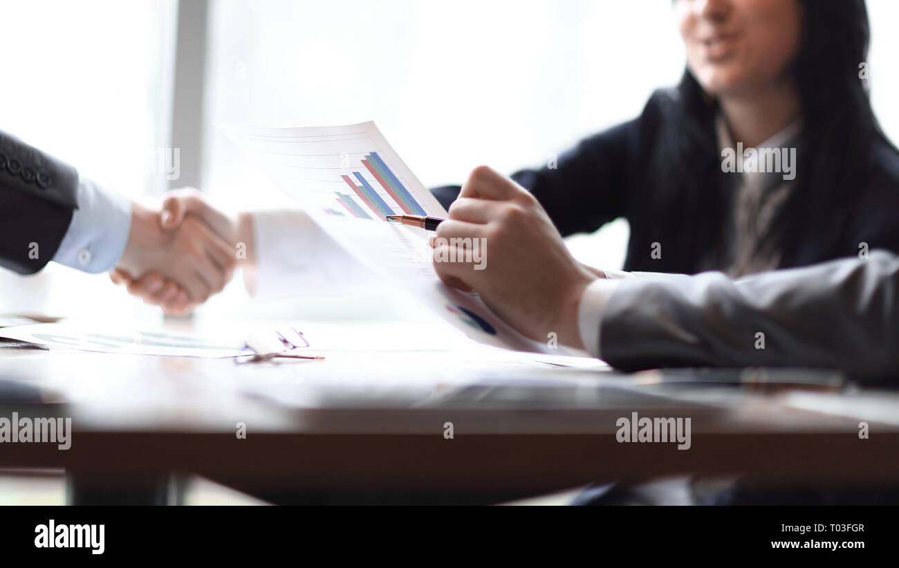 image of a business handshake business women with business partner ...