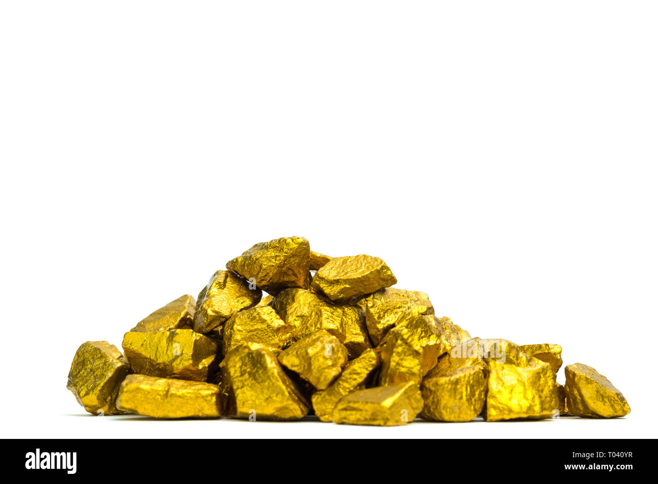 A pile of gold nuggets or gold ore on white background, precious stone ...