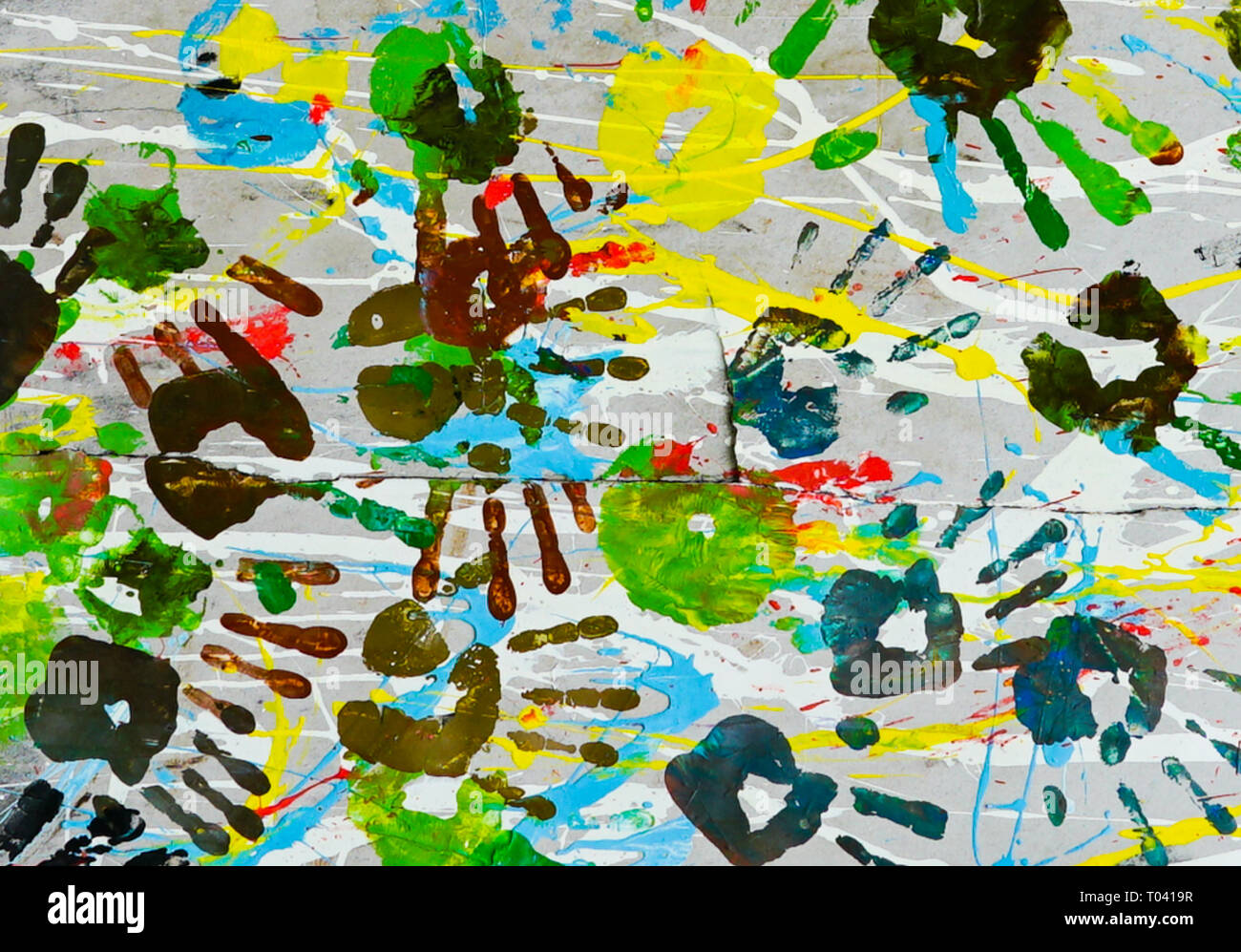 Many colorful hand prints hi-res stock photography and images - Alamy