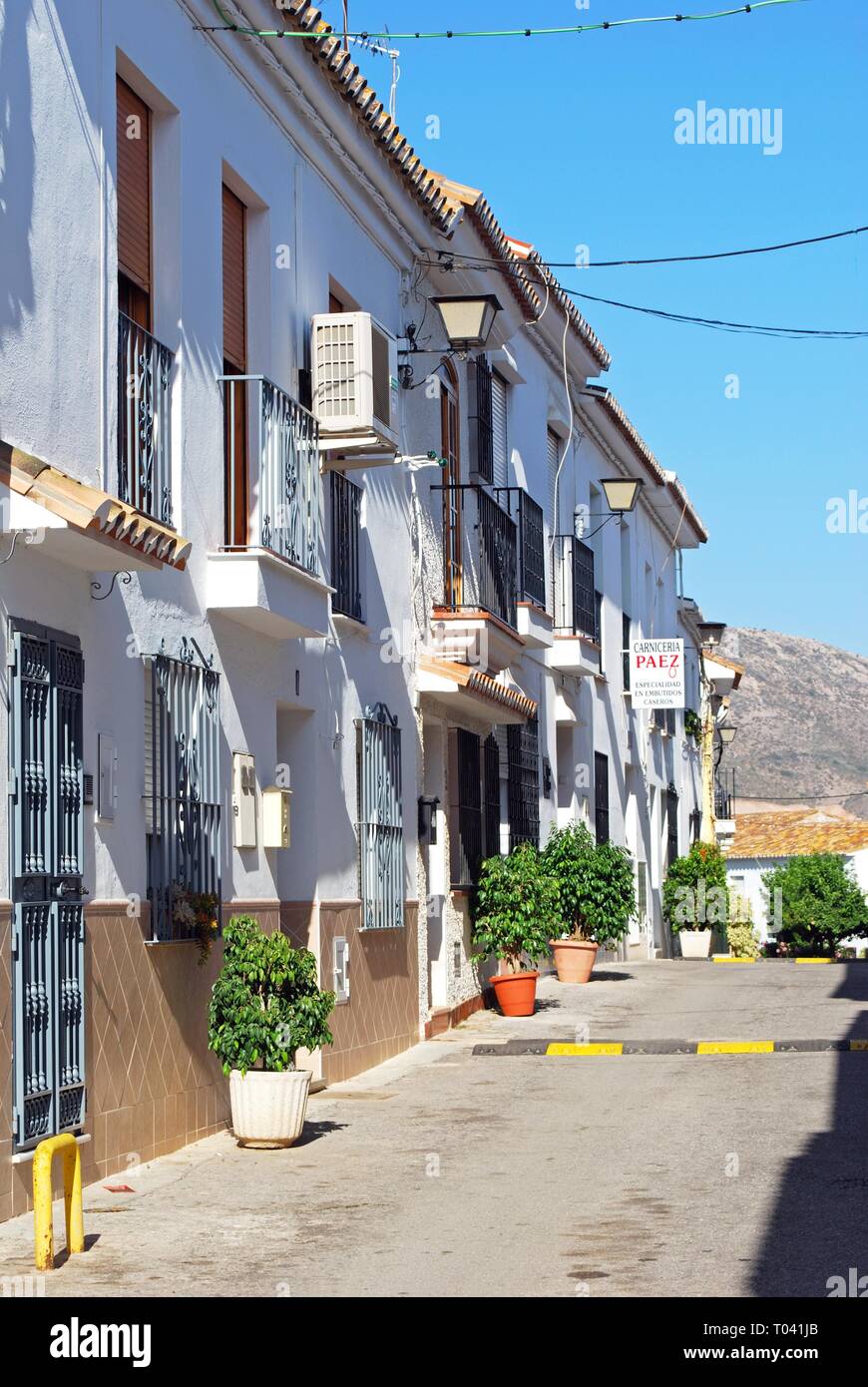 Traditional Spanish townhouses along an old town street, Benalmadena ...