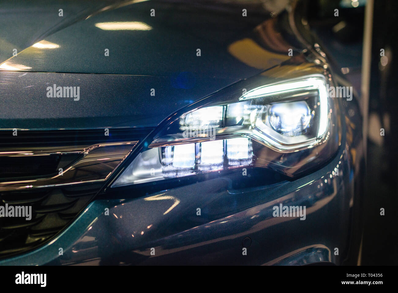 Car headlight with backlight. Exterior detail.White color car - image ...