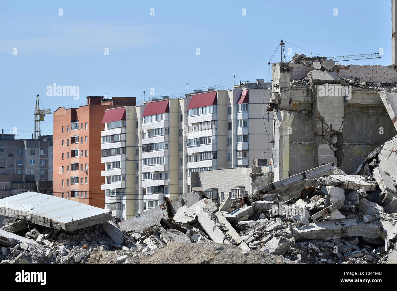 The remains of the concrete structure of the building against the ...