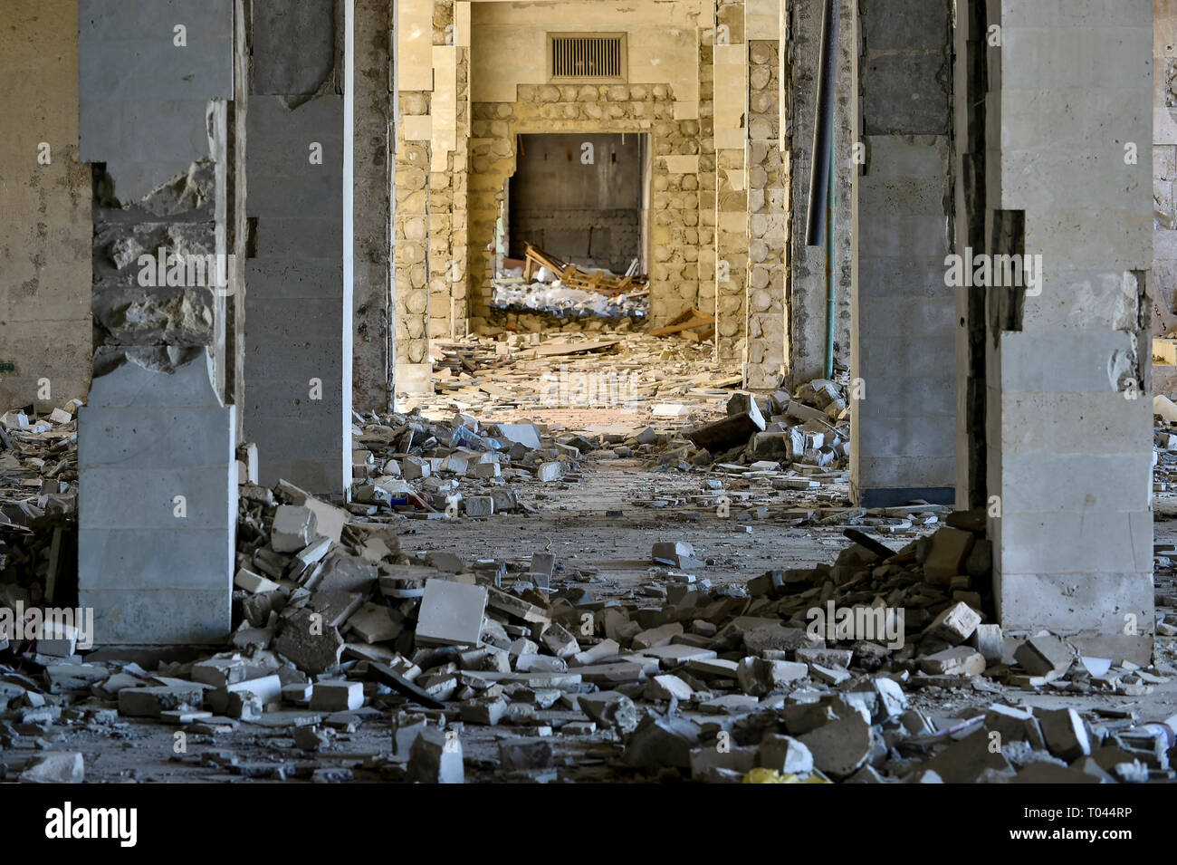 The destroyed internal part of the building in the form of a tunnel of ...