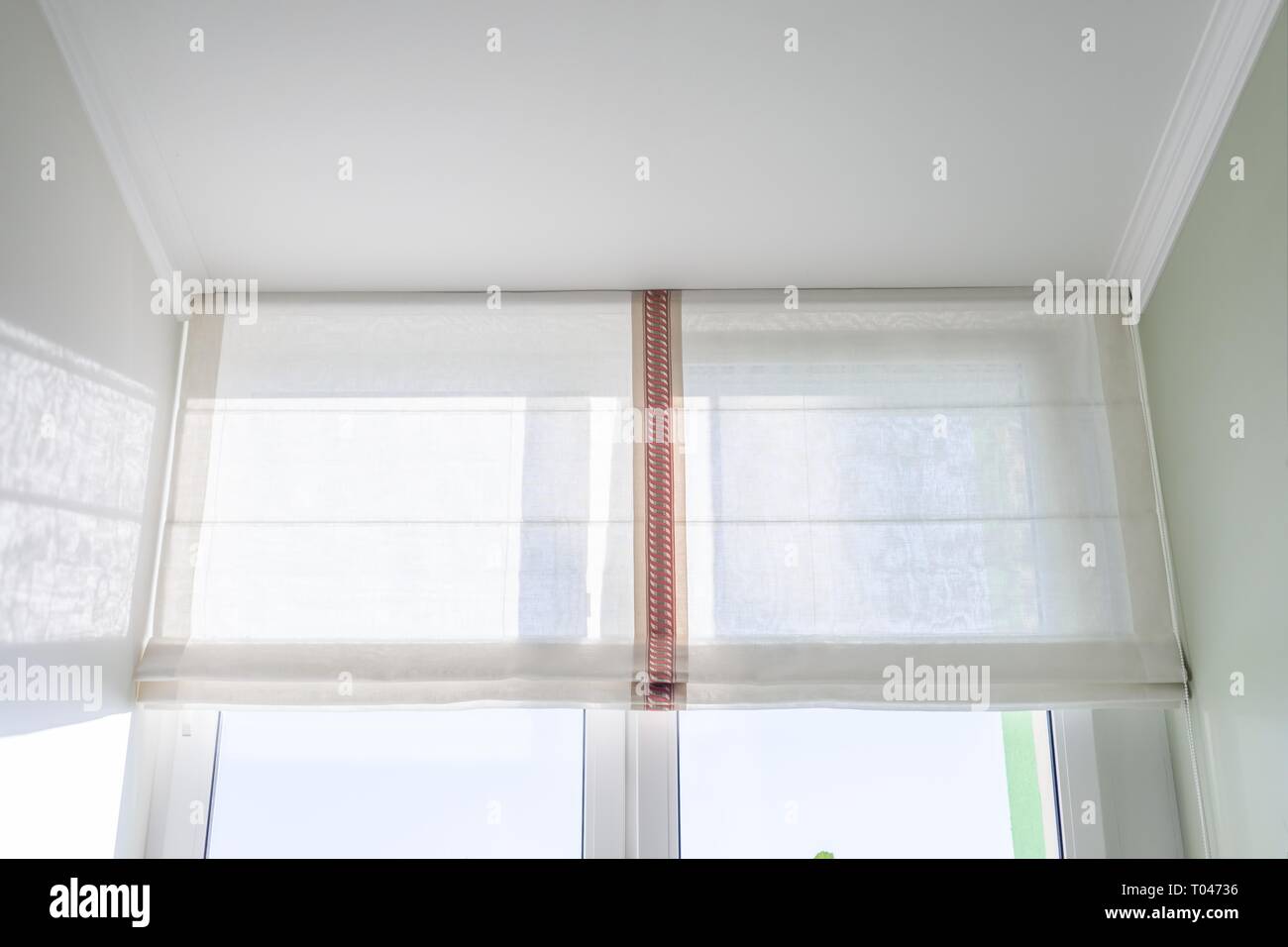 Roman curtains in the interior. From natural light linen, with ...