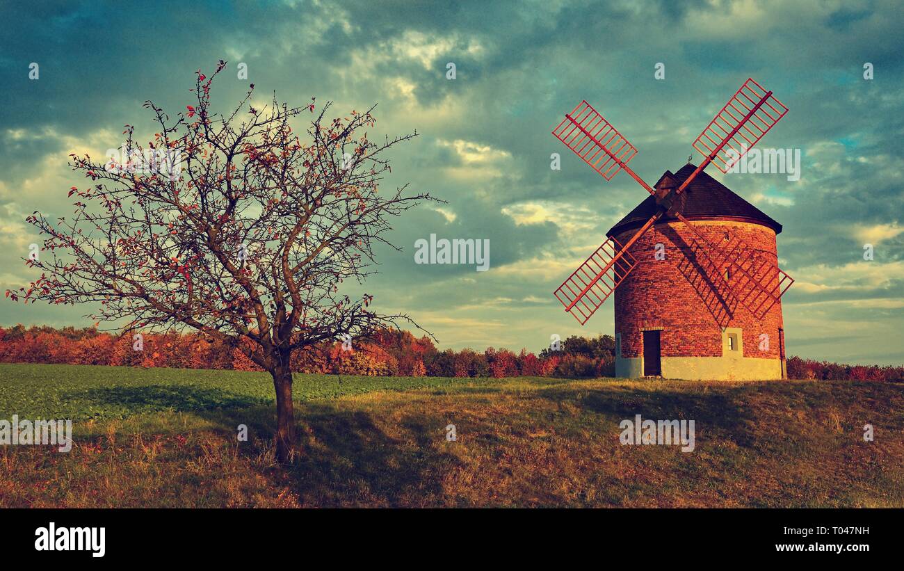 Beautiful old windmill in autumn time. Landscape photo with ...