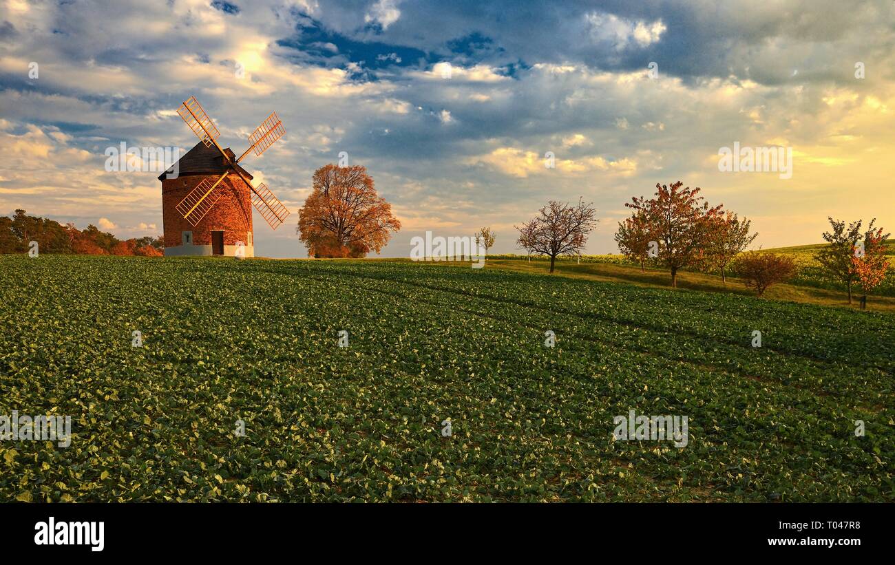 Beautiful old windmill in autumn time. Landscape photo with ...