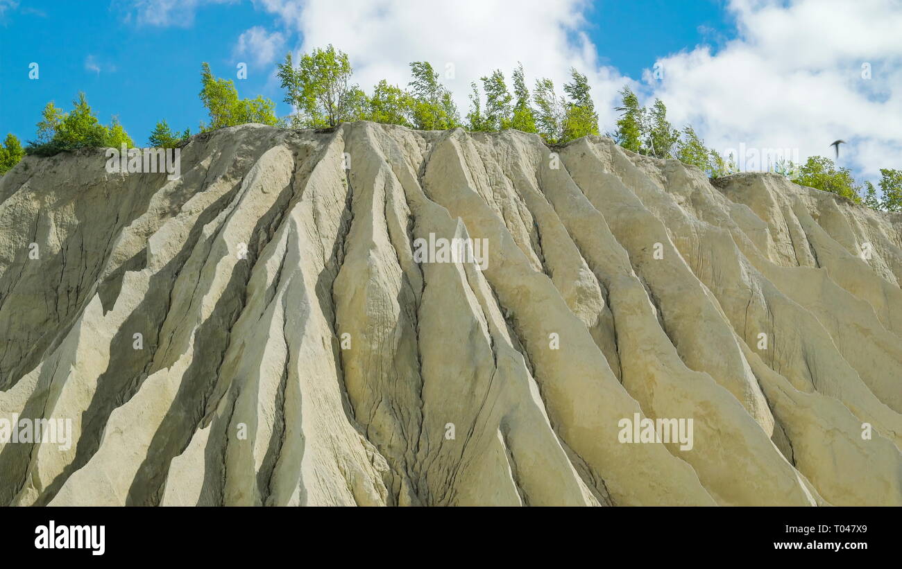 A white mountain of white stones in Rummu Vasalema Estonia. The erosion ...