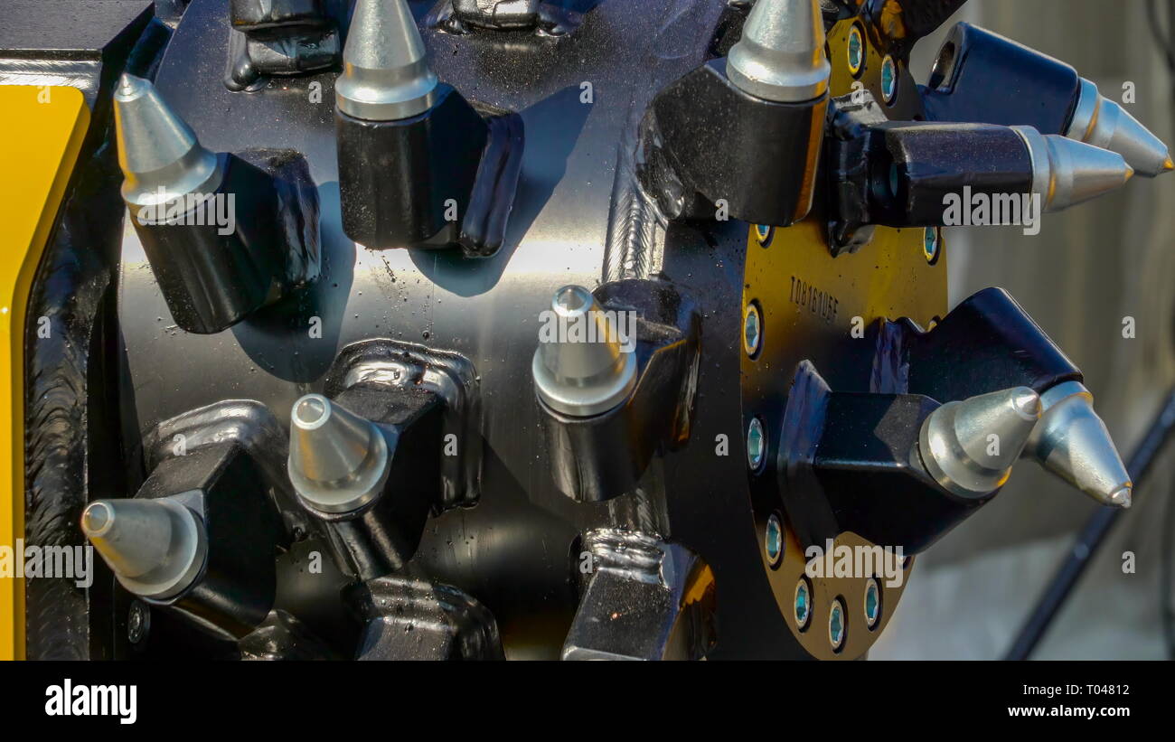 The spikes in front of the big heavy equipment the silver spikes with ...