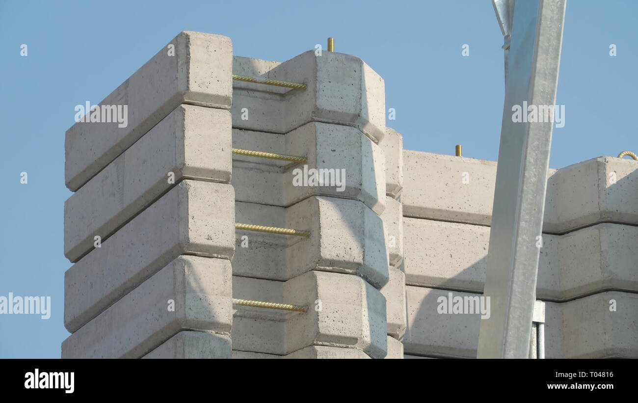 The cemented blocks of walls from the industrial site it has iron rods ...