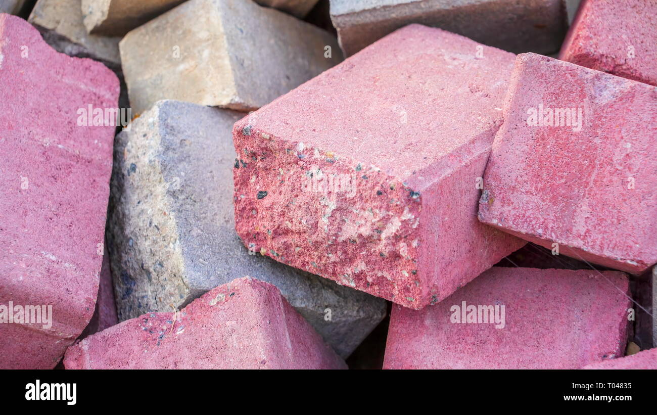 Lots of bricks on the floor from a display room these bricks are in red ...