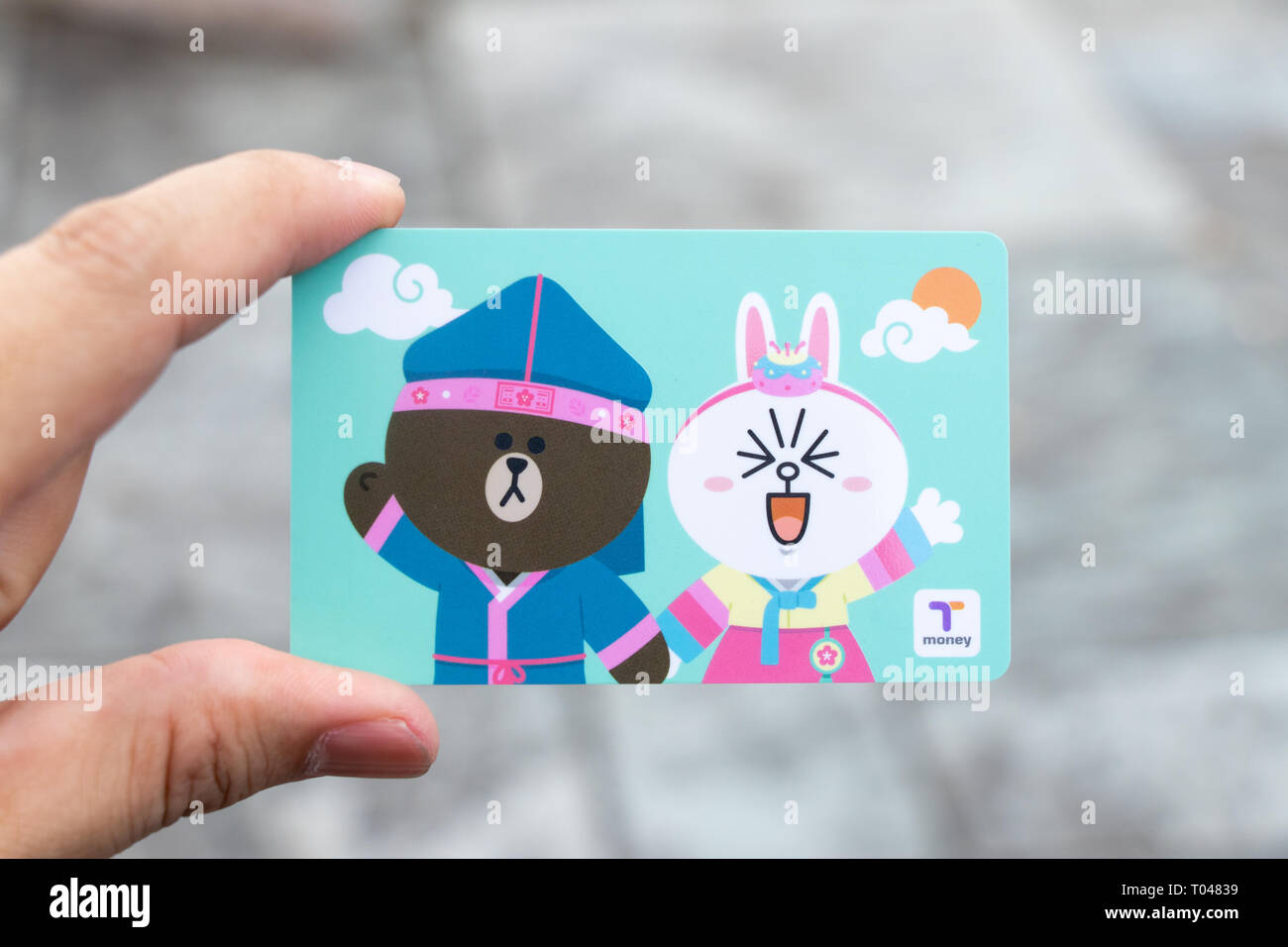 Seoul, South Korea- Sep 4, 2018 : Traveller hand hold t money card with ...