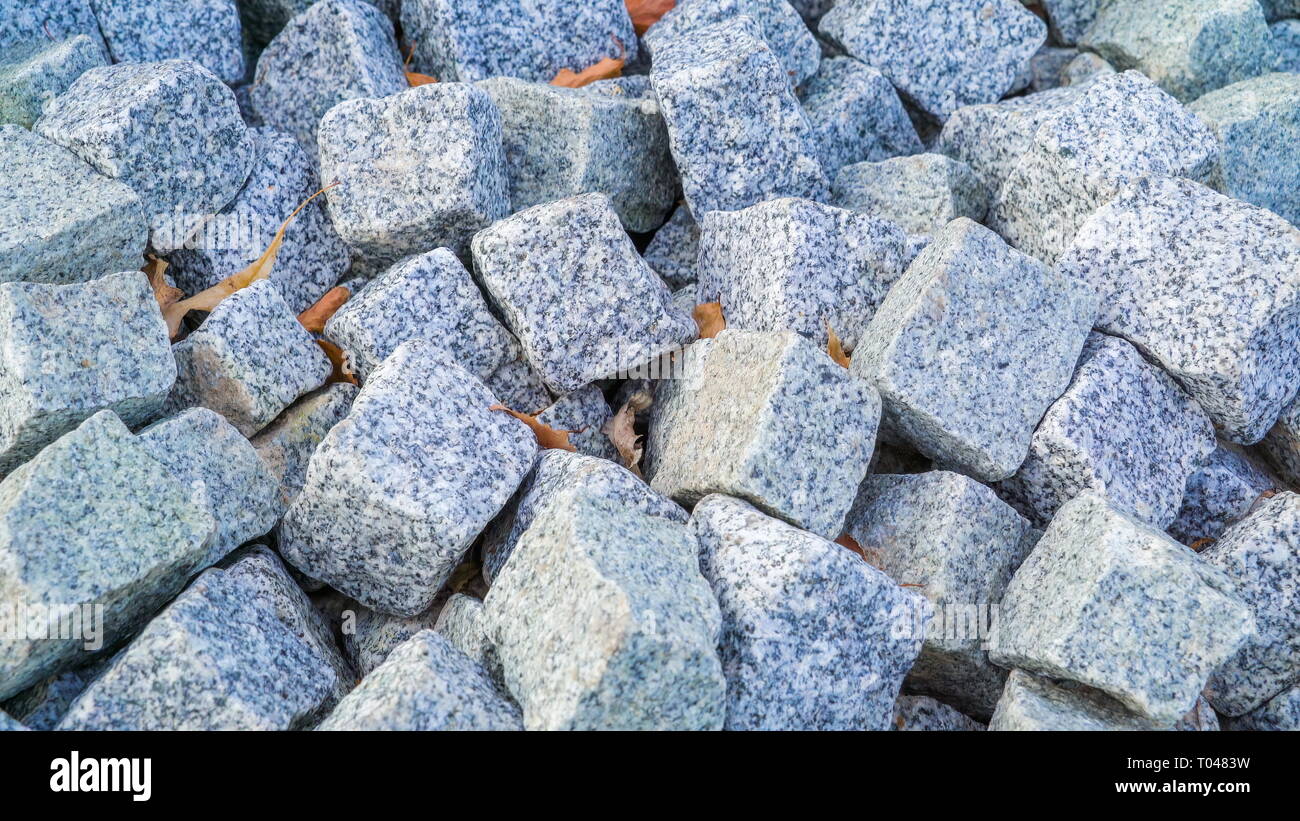 Heap of white small bricks covered in small white stones these bricks ...