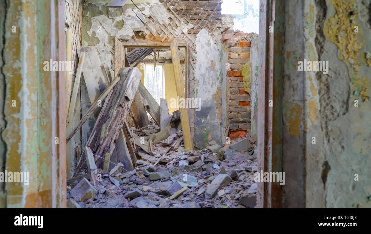 Closer look of the rubbles scattered on the floor of the ruined house ...