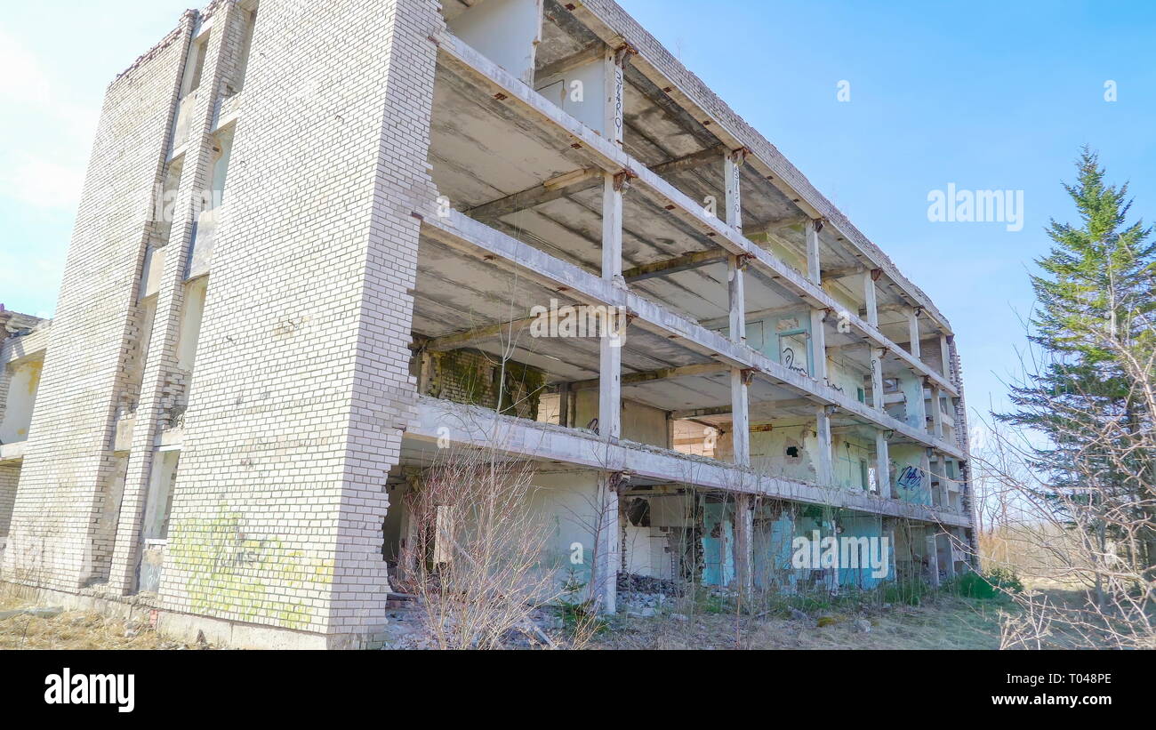 Outside look of the ruined building during the war where the walls are ...