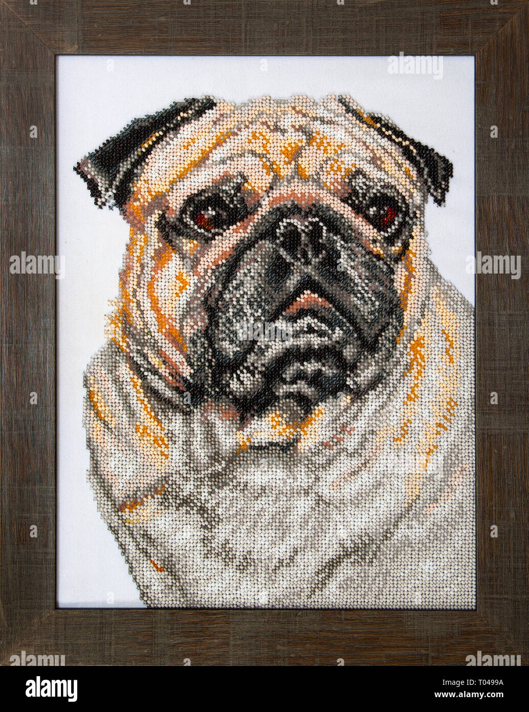 The portrait of a dog embroidered with beads. Vertical format Stock ...