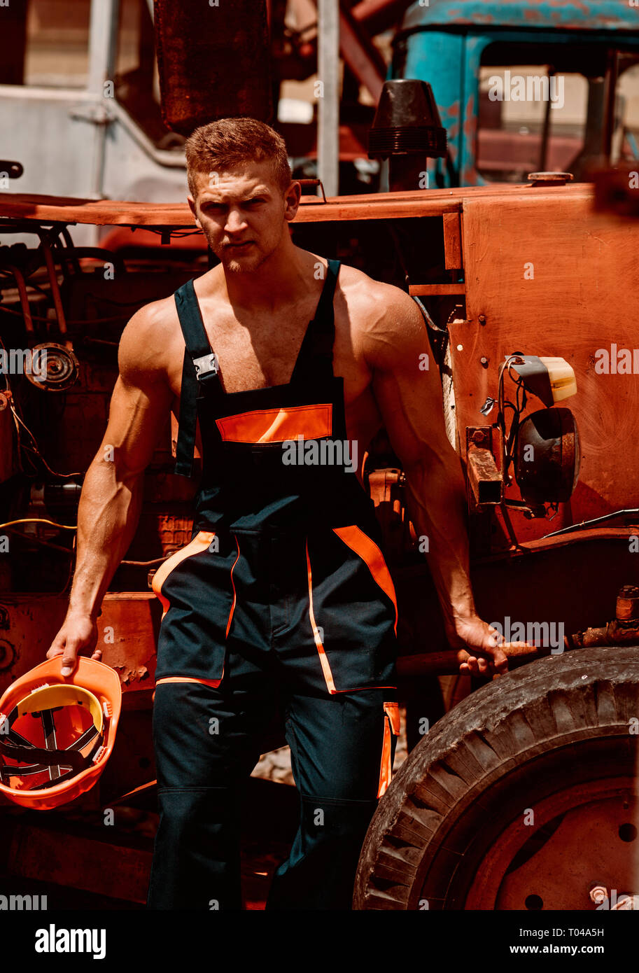 Man concept. Handsome man empoyee rest at tractor cabin. Confident man ...