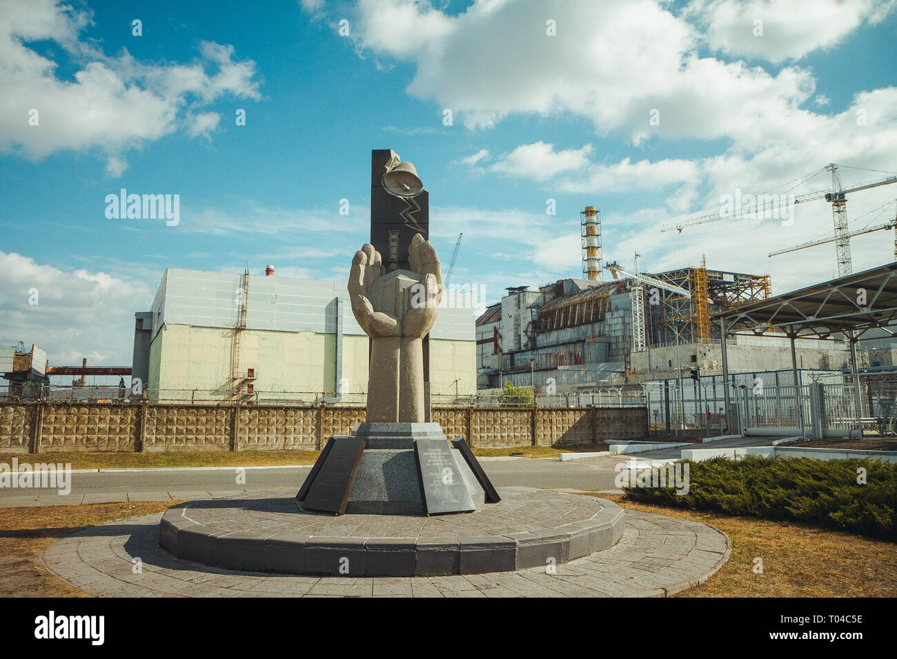 Monument to the Chernobyl Liquidators and fourth reactor without ...