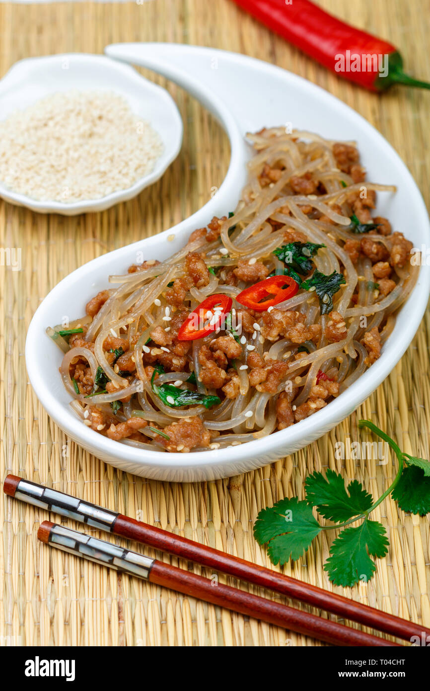 Chinese dish of starch glass noodles (rice, potatoes, beans) with meat ...