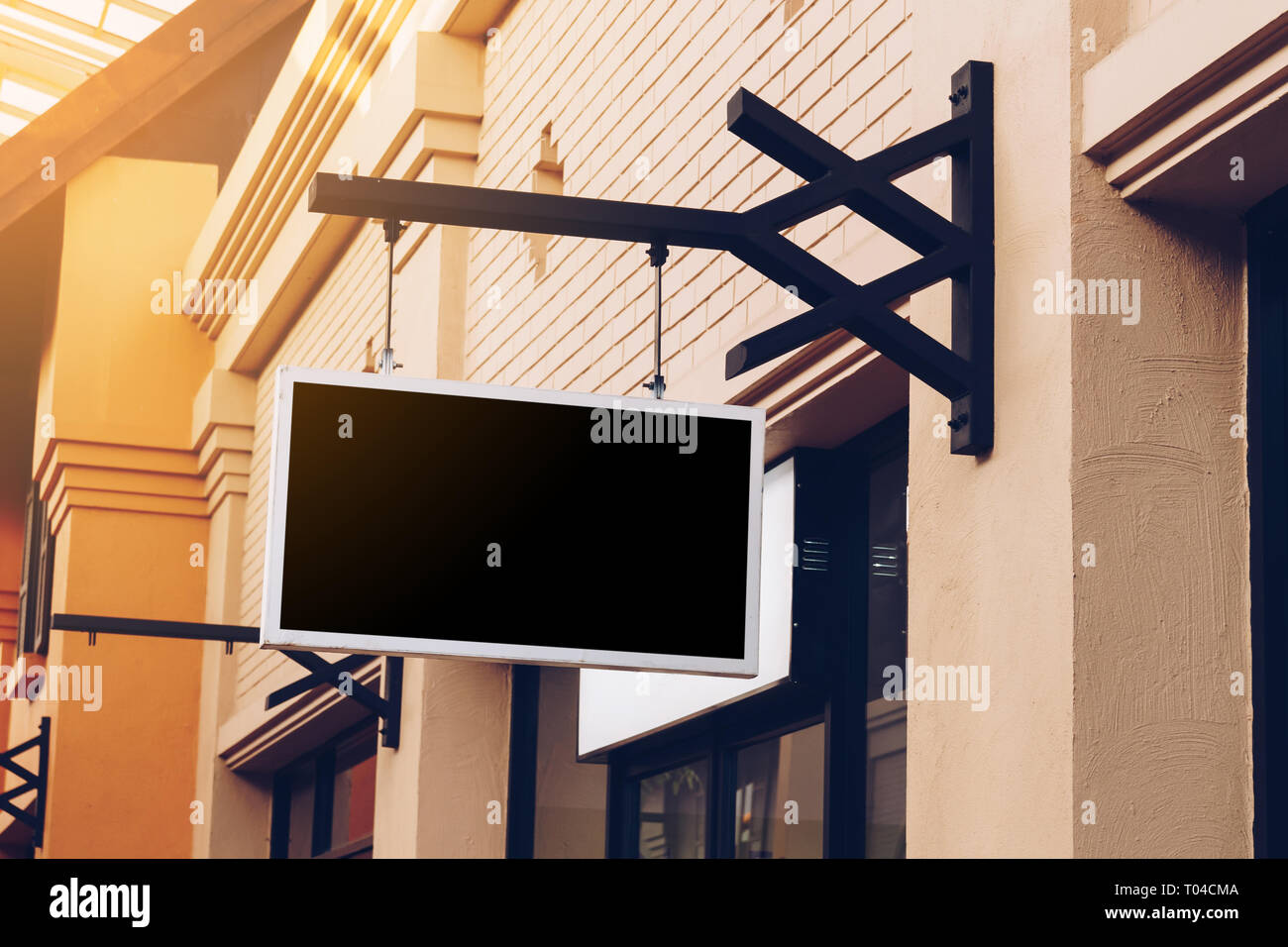 horizontal blank empty signage on clothes shop front with copy space ...