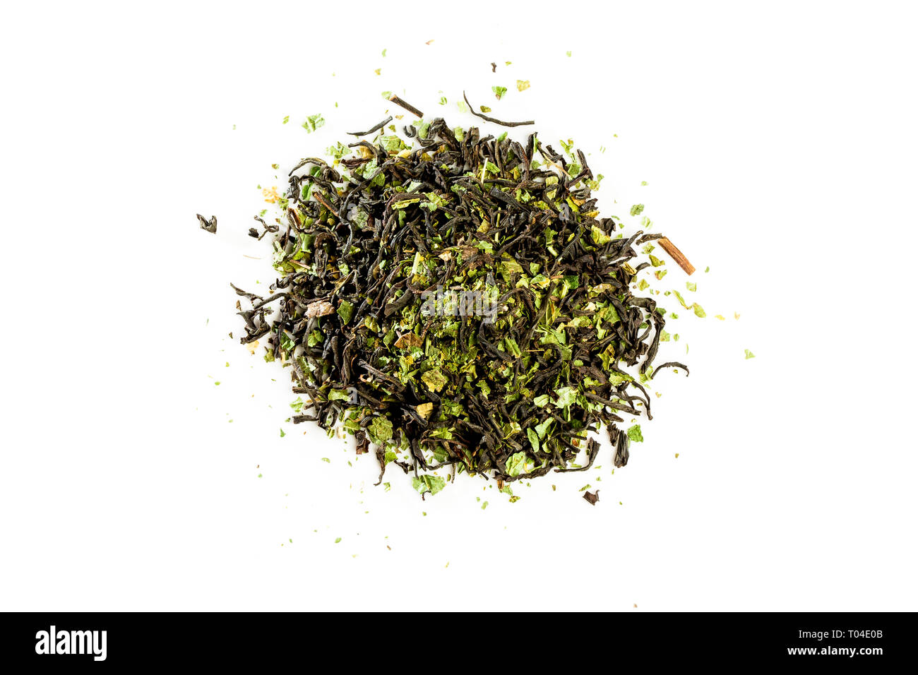 Aromatic crumbly Handful of Dry tea leaves isolated on white background ...