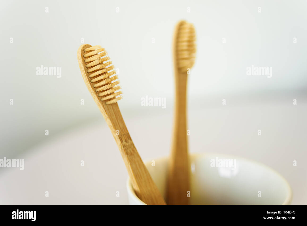 Toothbrush and toothpaste in cup hi-res stock photography and images ...