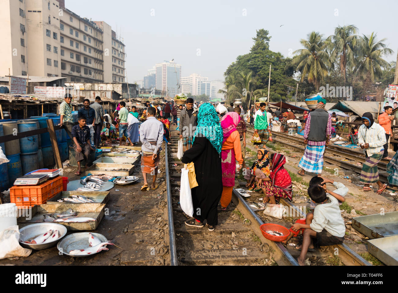 A local market set on railroad track dangerously close to passing ...