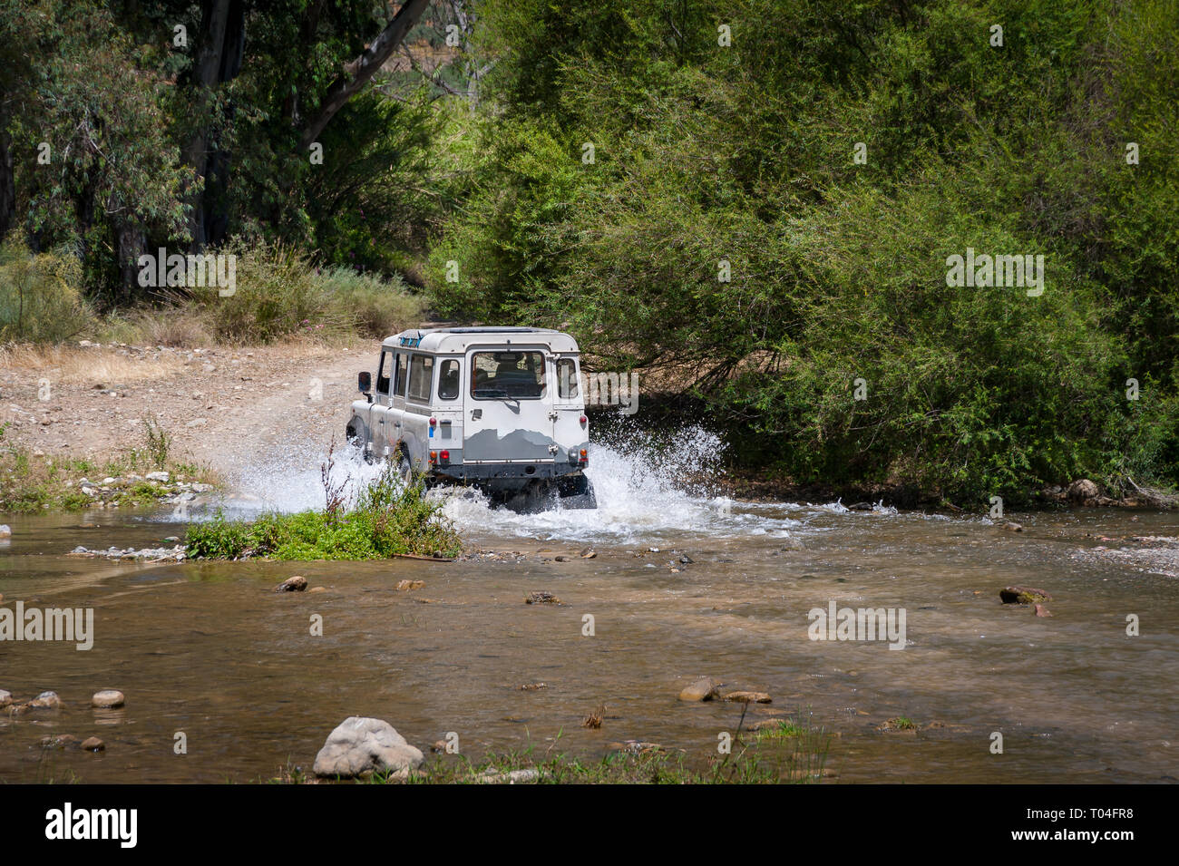 Rural Andalucia. Spain. 06/10/2016. Riverbed crossing in 4x4 terrain ...