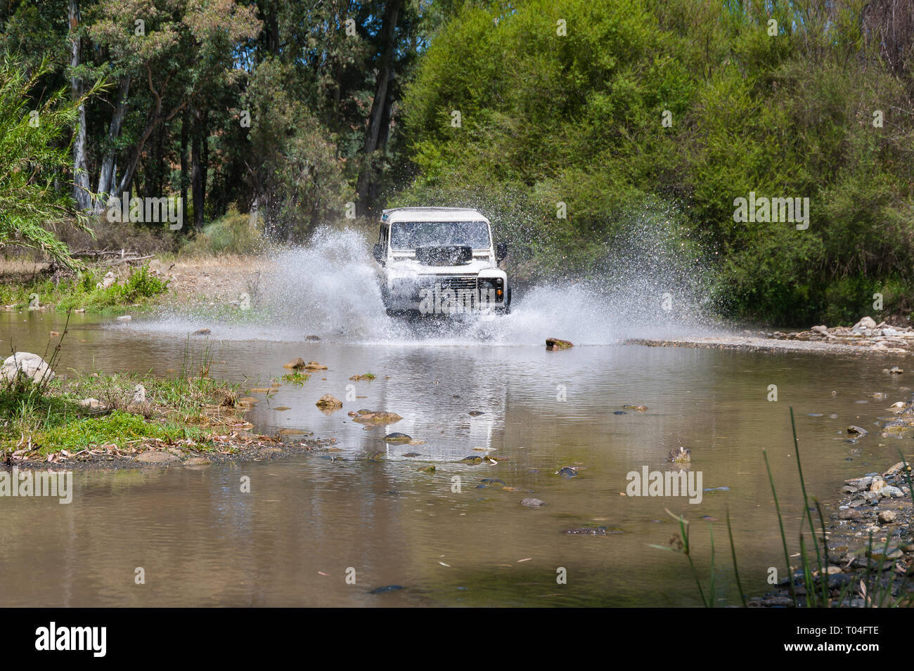 Rural Andalucia. Spain. 06/10/2016. Riverbed crossing in 4x4 terrain ...