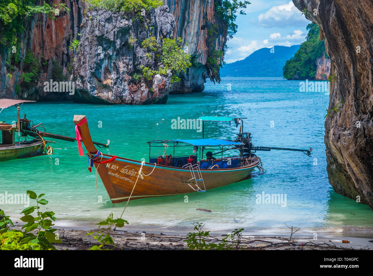 Scenic bay of Koh Lao La Ding island with thai boats, Krabi, Thailand ...