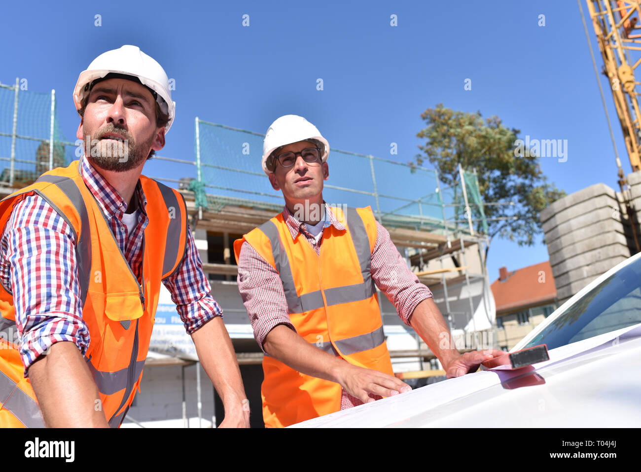 construction manager and architect on site during the construction of a ...