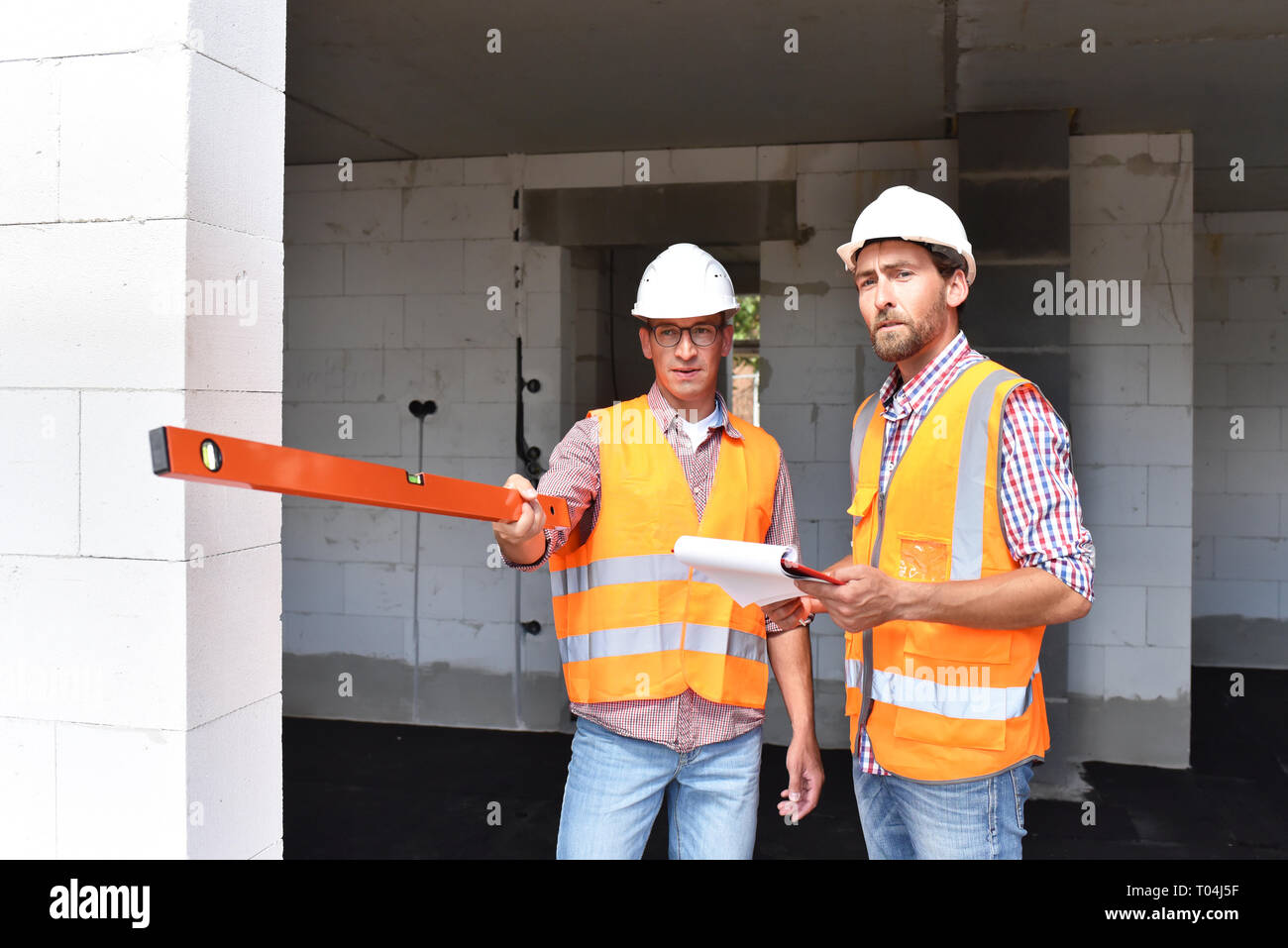 construction manager and architect on site during the construction of a ...