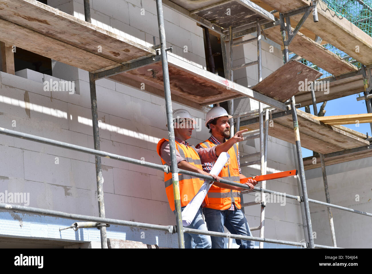 construction manager and architect on site during the construction of a ...