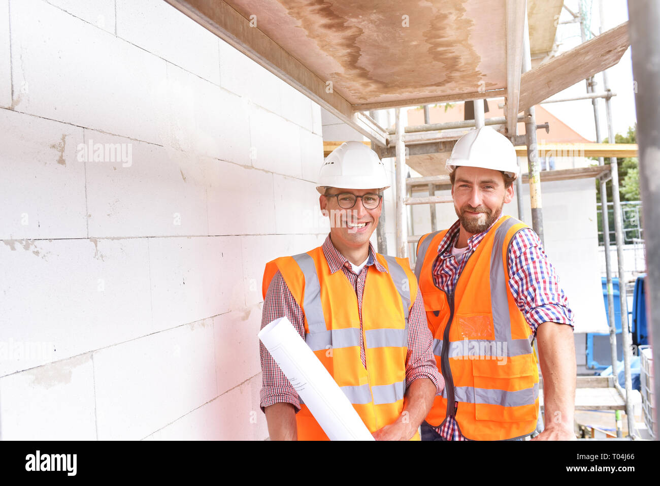construction manager and architect on site during the construction of a ...