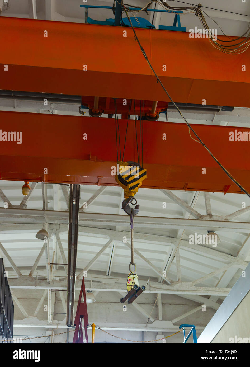 Factory bridge crane for lifting cargo in an enterprise Stock Photo - Alamy