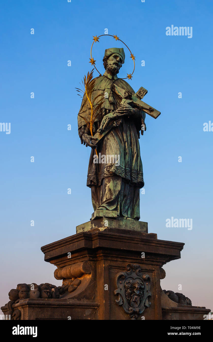 Saint John of Nepomuk statue on Charles Bridge in Prague, Czechia ...