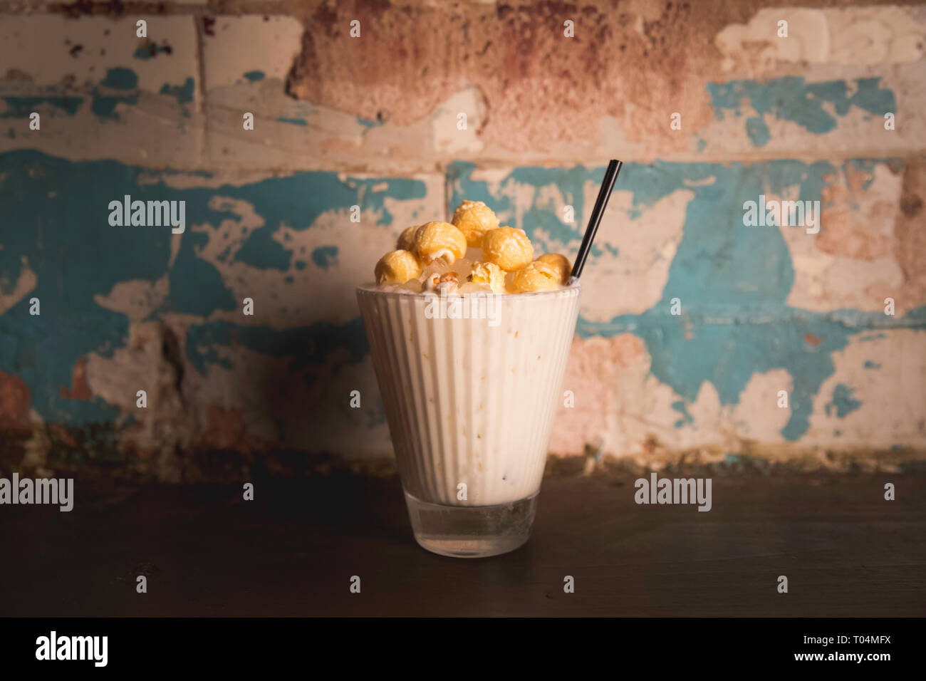 Creamy popcorn cocktail on bar Stock Photo - Alamy