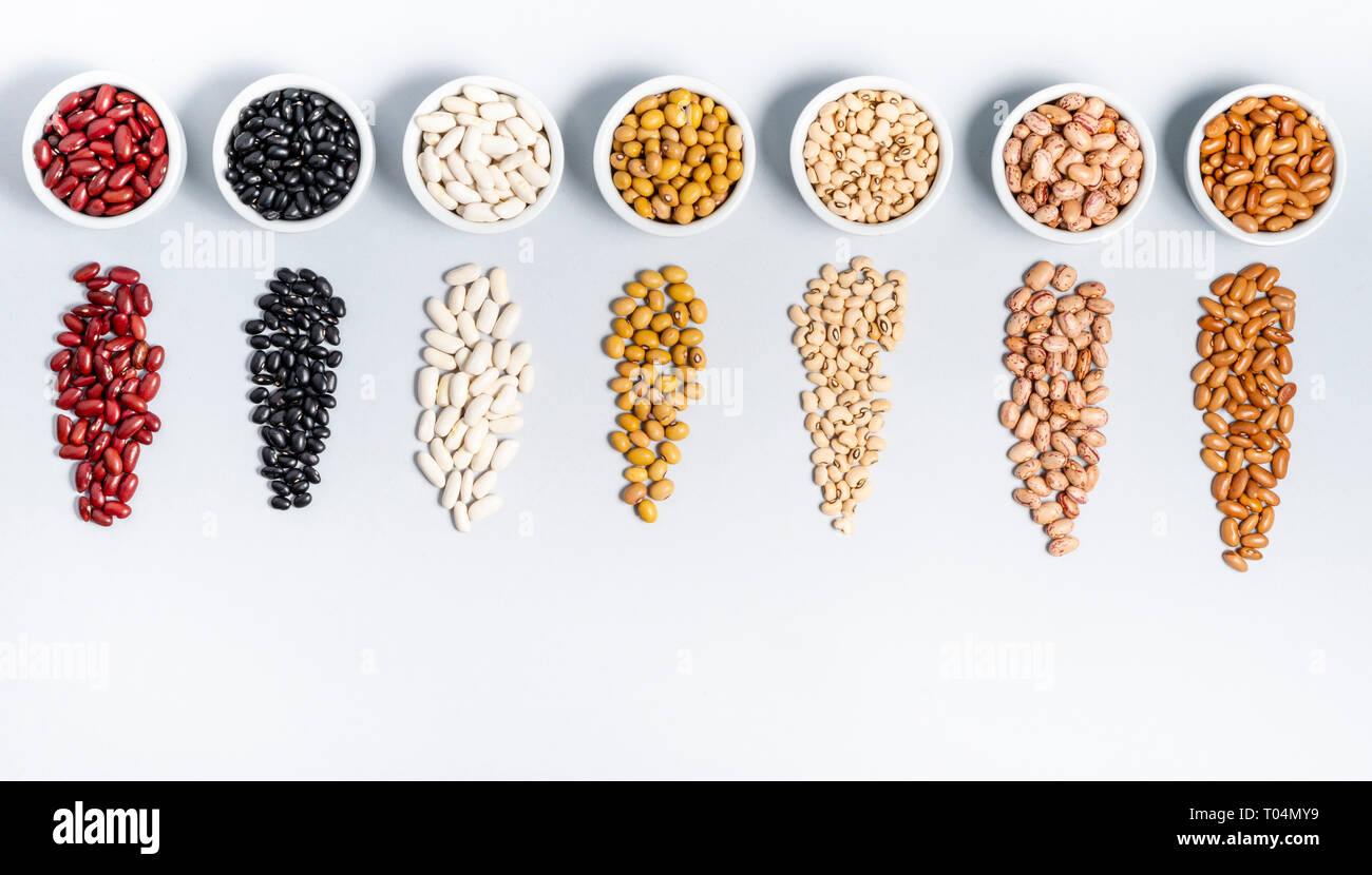 Varieties of beans on gray background Stock Photo - Alamy