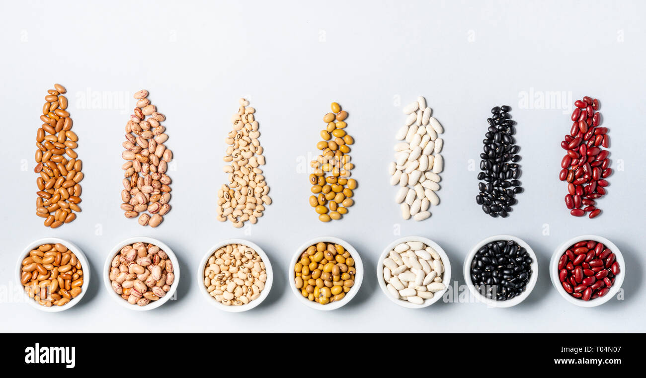 Varieties of beans on gray background Stock Photo - Alamy
