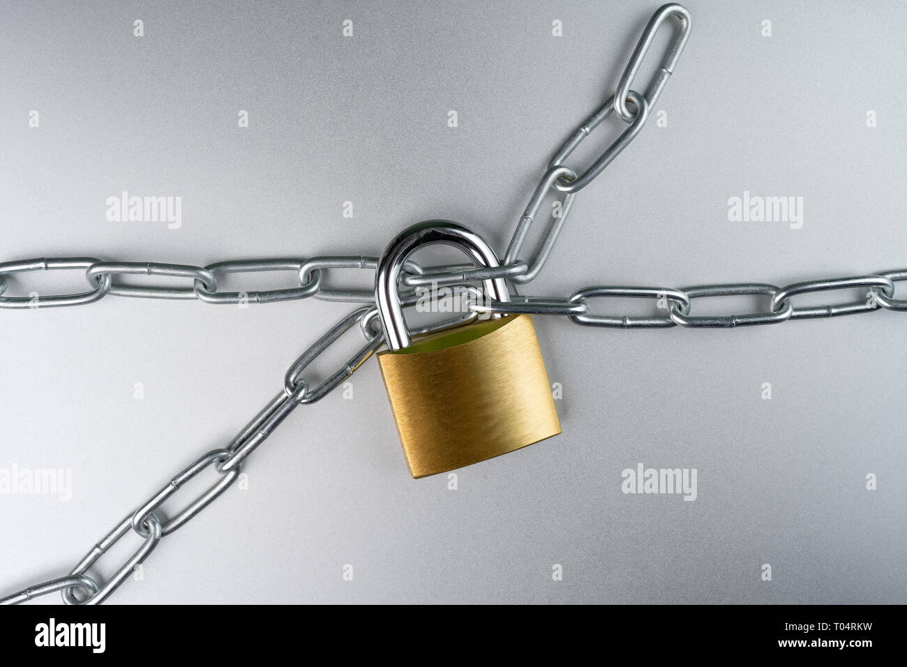 Padlock with chain on steel grey background. Security abstract concept ...