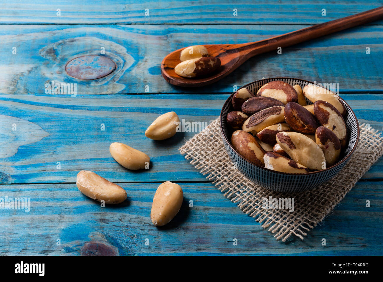 Chestnut Inside ceramic pot on blue pine wood Stock Photo - Alamy