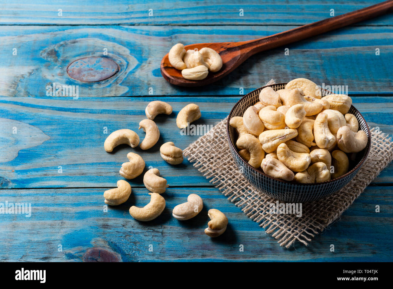 Natural chestnut inside ceramic pot on blue pine wood Stock Photo - Alamy