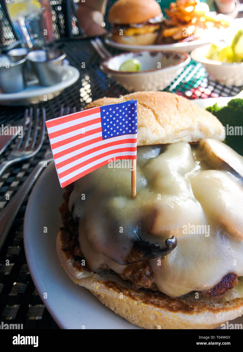 Homemade Cheeseburger at American Restaurant Stock Photo - Alamy
