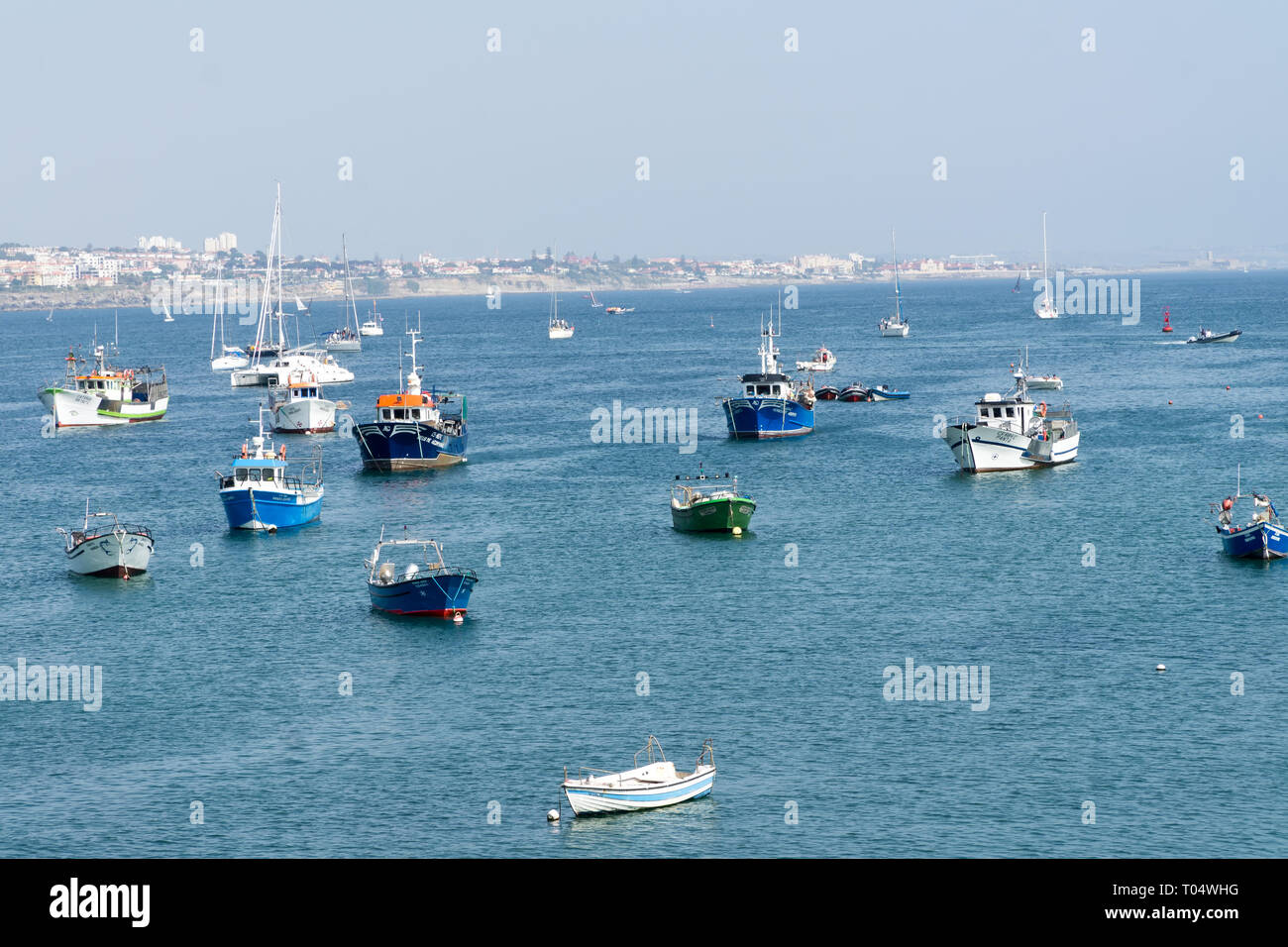 CASCAIS, PORTUGAL - September 2, 2018: Fishing boats floating in the ...