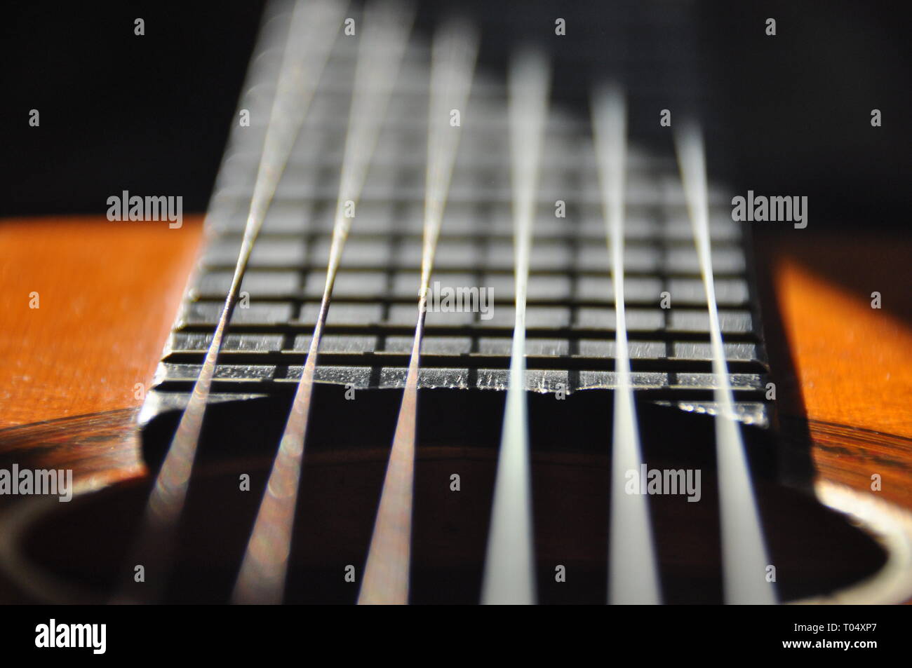 Classical guitar. Issuing a stringed instrument sounds. Fretboard ...