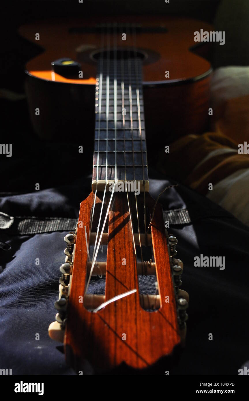 Classical guitar. Issuing a stringed instrument sounds. Fretboard ...