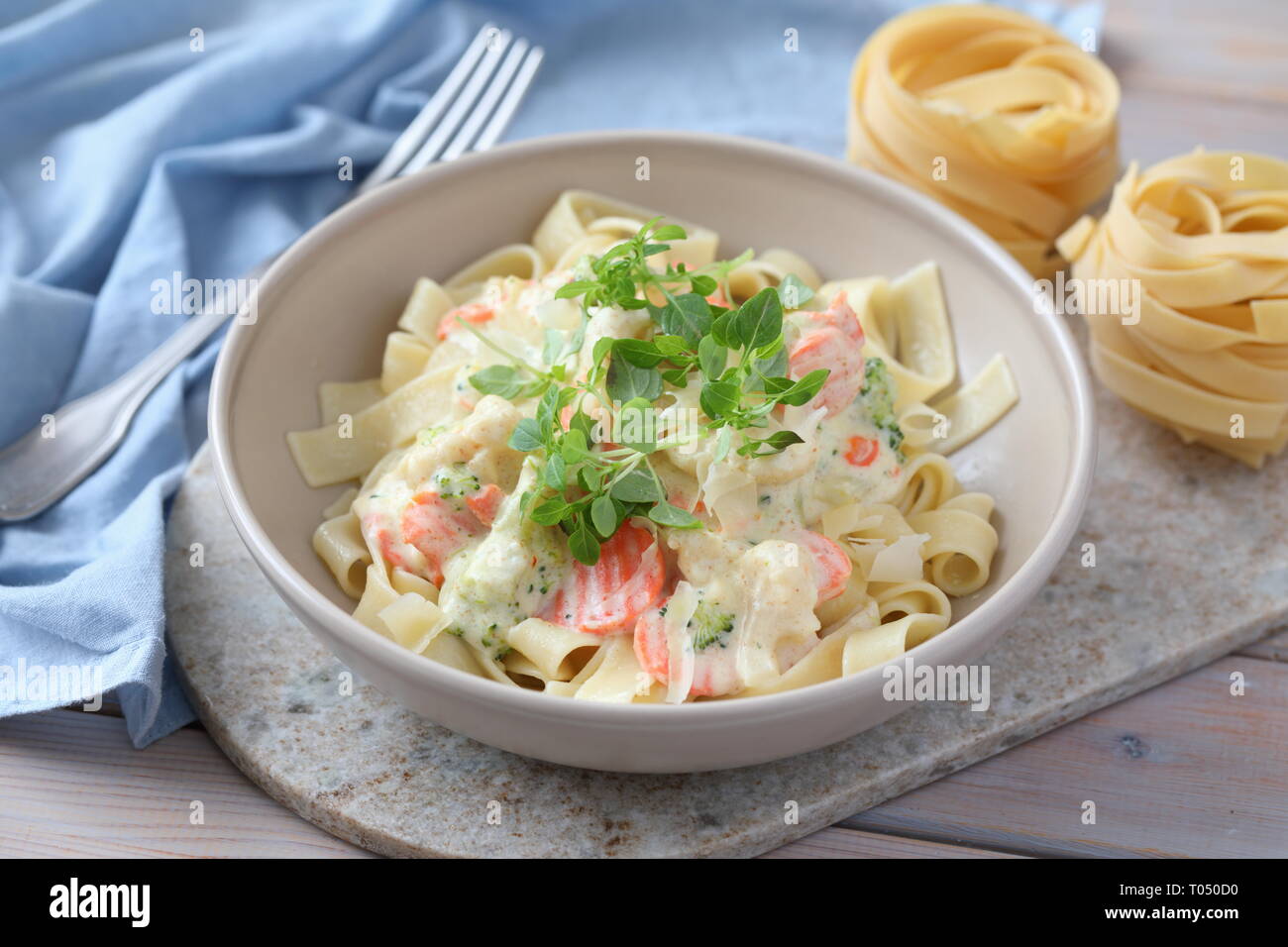 Spring Vegetable Fettuccine Alfredo Stock Photo - Alamy