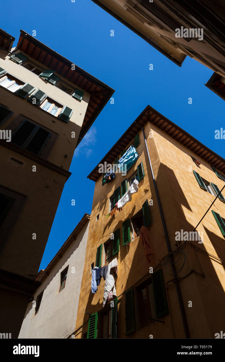 Laundry hanging out of window hi-res stock photography and images - Alamy