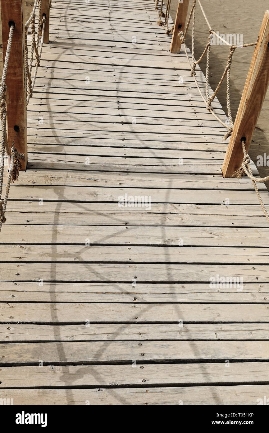 Wooden boardwalks-walkways for visiting the Rawak Stupa. Taklamakan ...